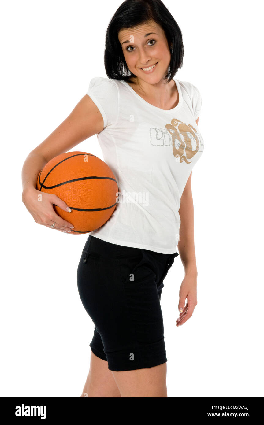 Girl holding basketball Stock Photo - Alamy
