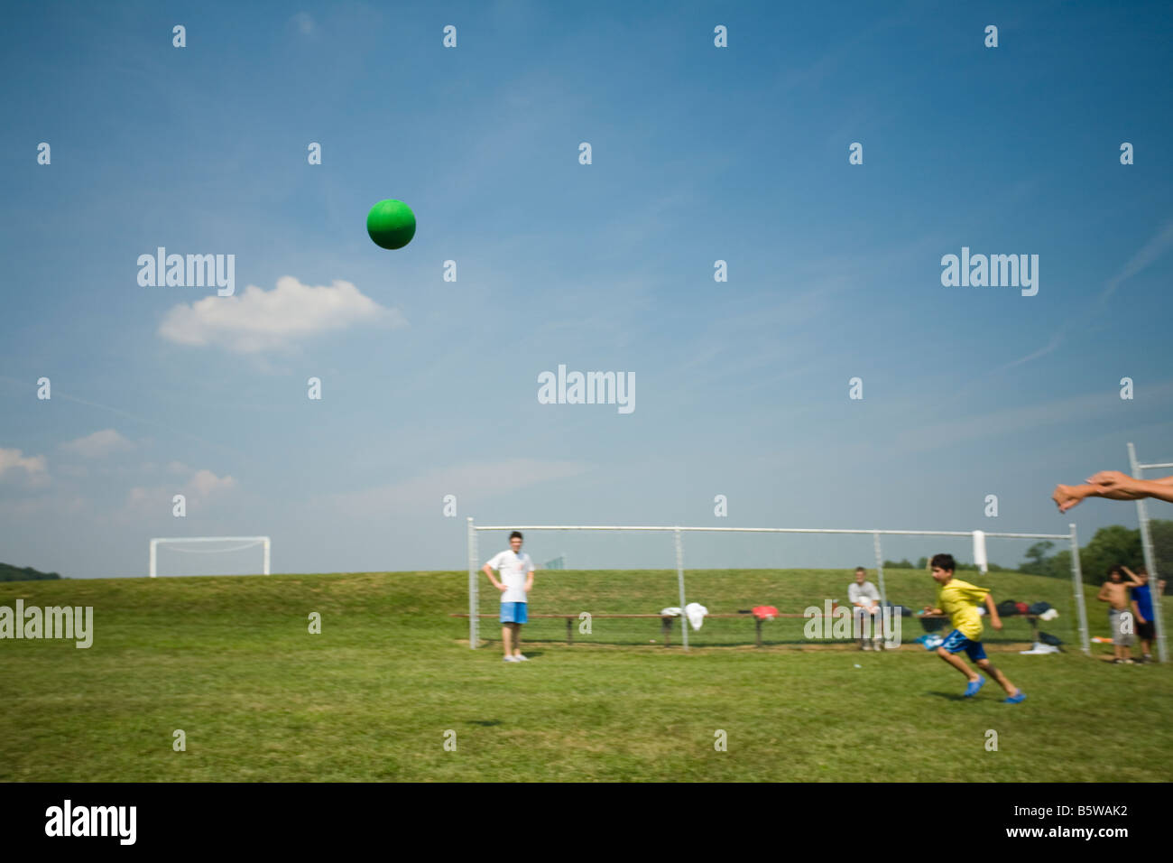 Kids playing kickball hi-res stock photography and images - Alamy