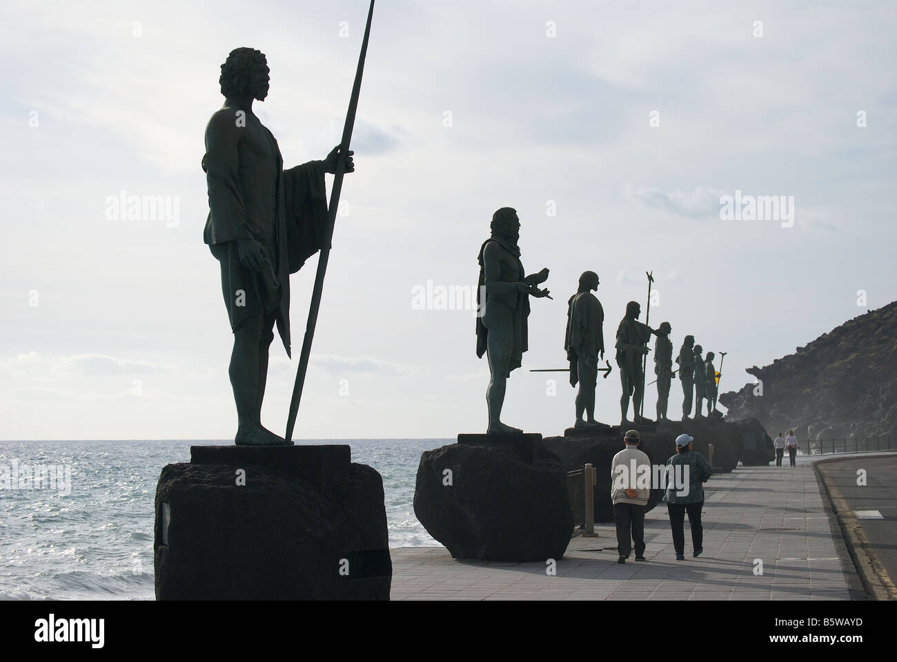 Guanche statues on waterfront, Plaza de La Patrona de Canarias ...