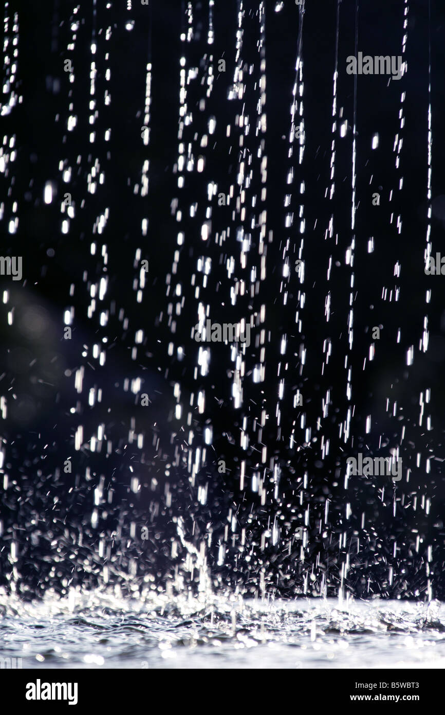 abstract many water drops falling on ground floor Stock Photo - Alamy