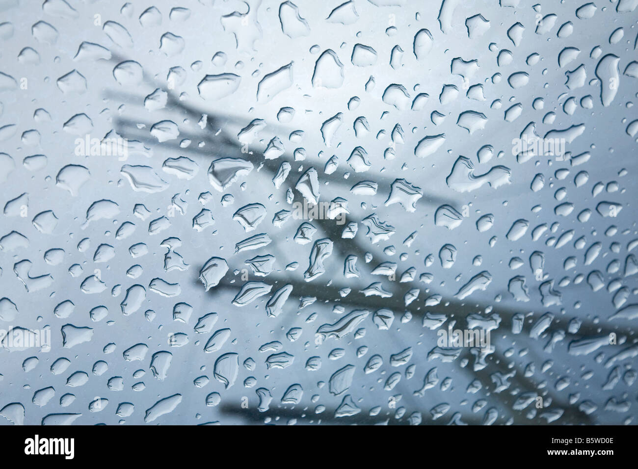 The mast of a sailing ship is seen through rain splashed glass Stock ...
