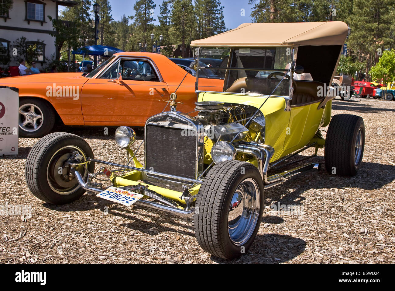 Yellow open wheel V8 hot rod convertable Stock Photo - Alamy