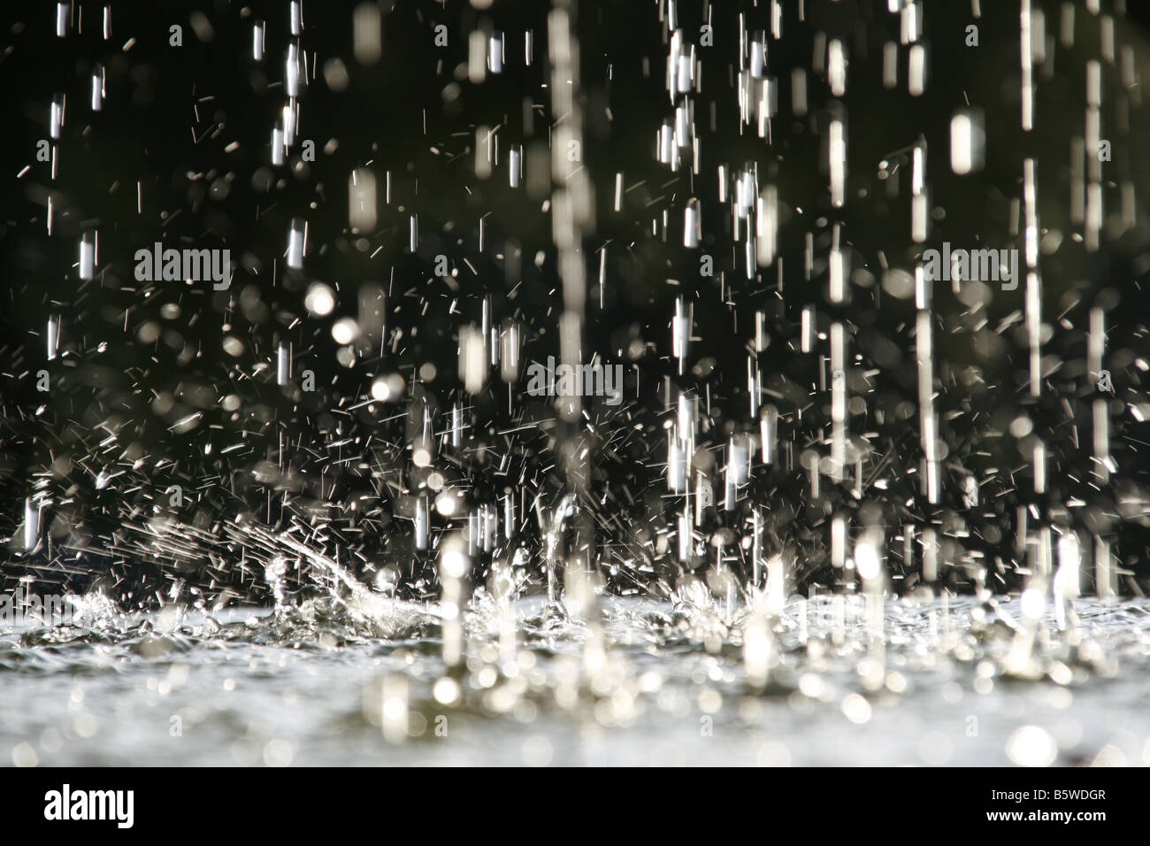 Backlit water drops from spray hi-res stock photography and images - Alamy