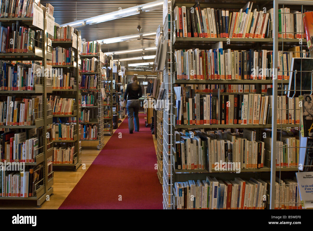 Central aisle of a French language public library Stock Photo - Alamy