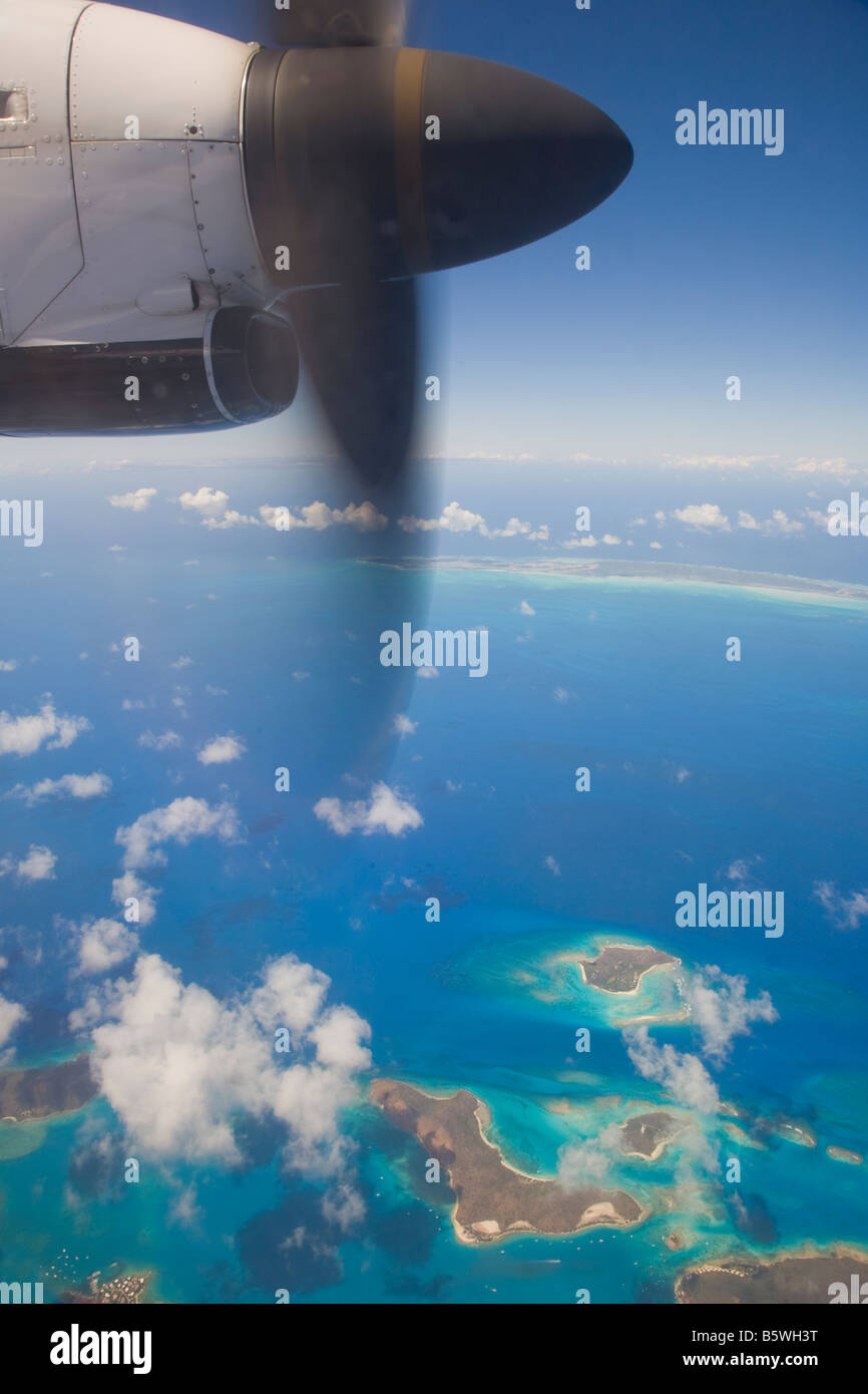 Clouds and sky out an airplane window over the caribbean Stock Photo ...