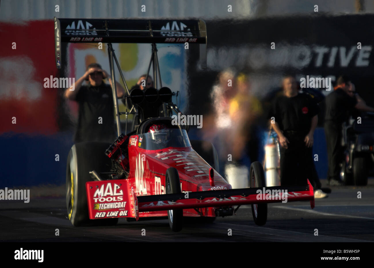 Doug Kalitta's "Mac Tools" NHRA Top Fuel dragster - taking off from the ...