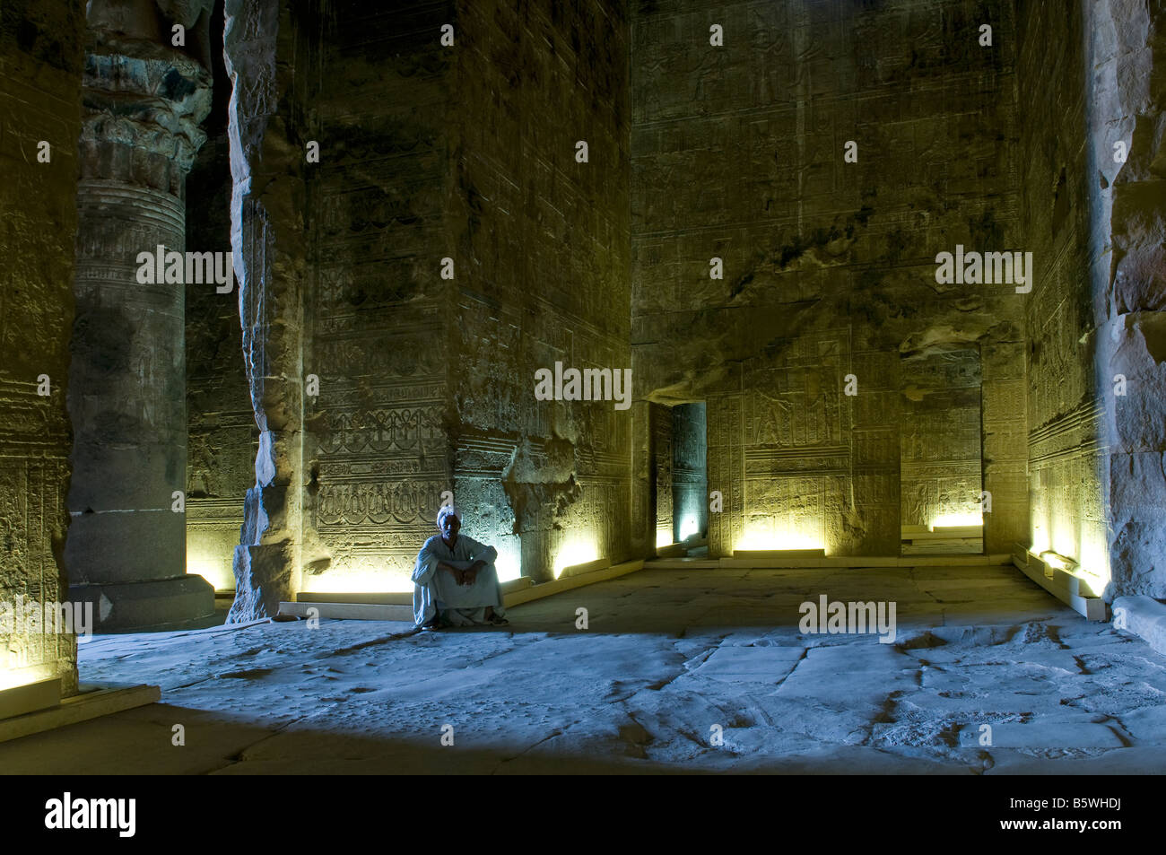 Egyptian guard sitting inside the inner sanctuary at Dendera or Dendara ...