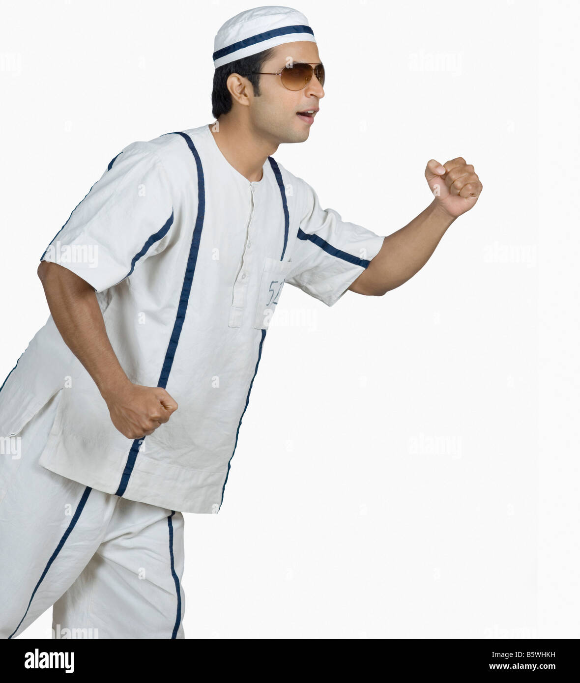 Side profile of a prisoner running Stock Photo - Alamy