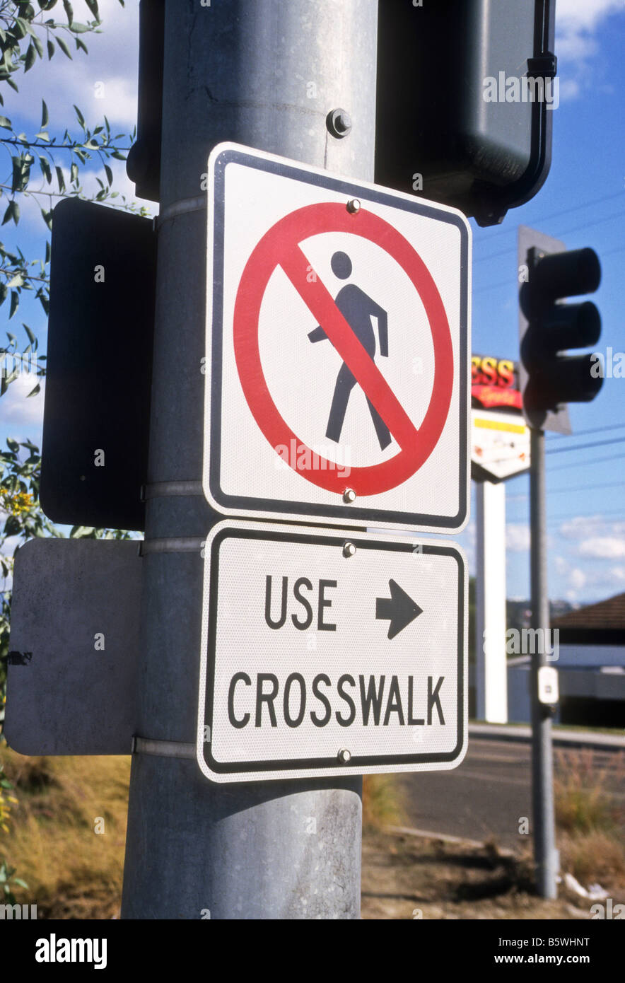 Sign warns of no crosswalk for pedestrian Stock Photo - Alamy