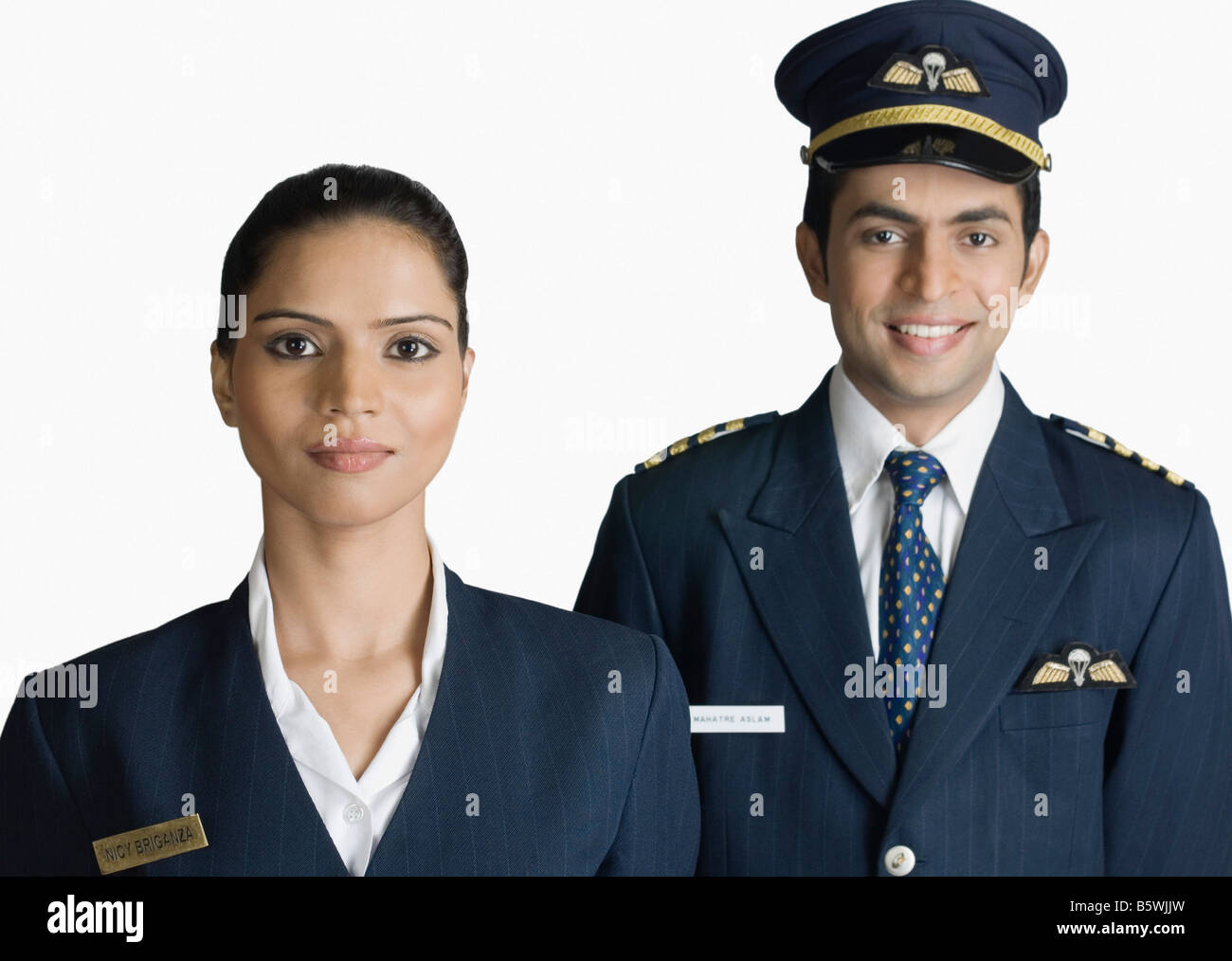 Portrait of a pilot with an air hostess Stock Photo - Alamy