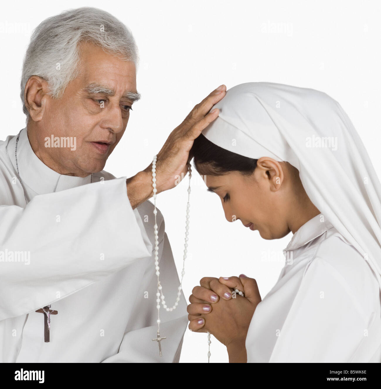Nun confessing her sins to a priest Stock Photo - Alamy