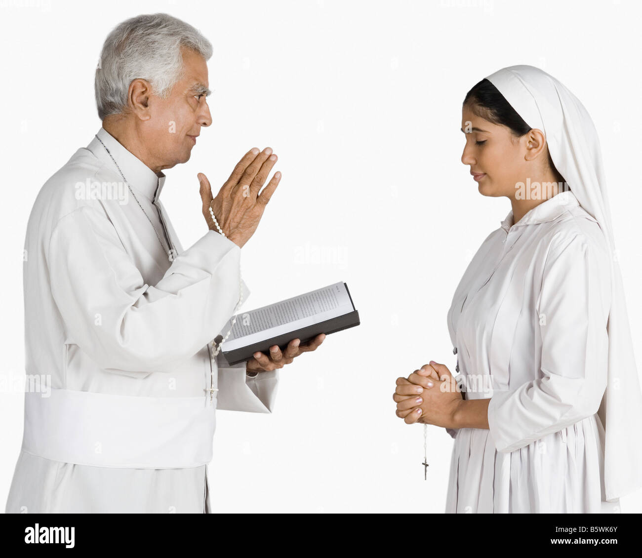 Nun confessing her sins to a priest Stock Photo - Alamy