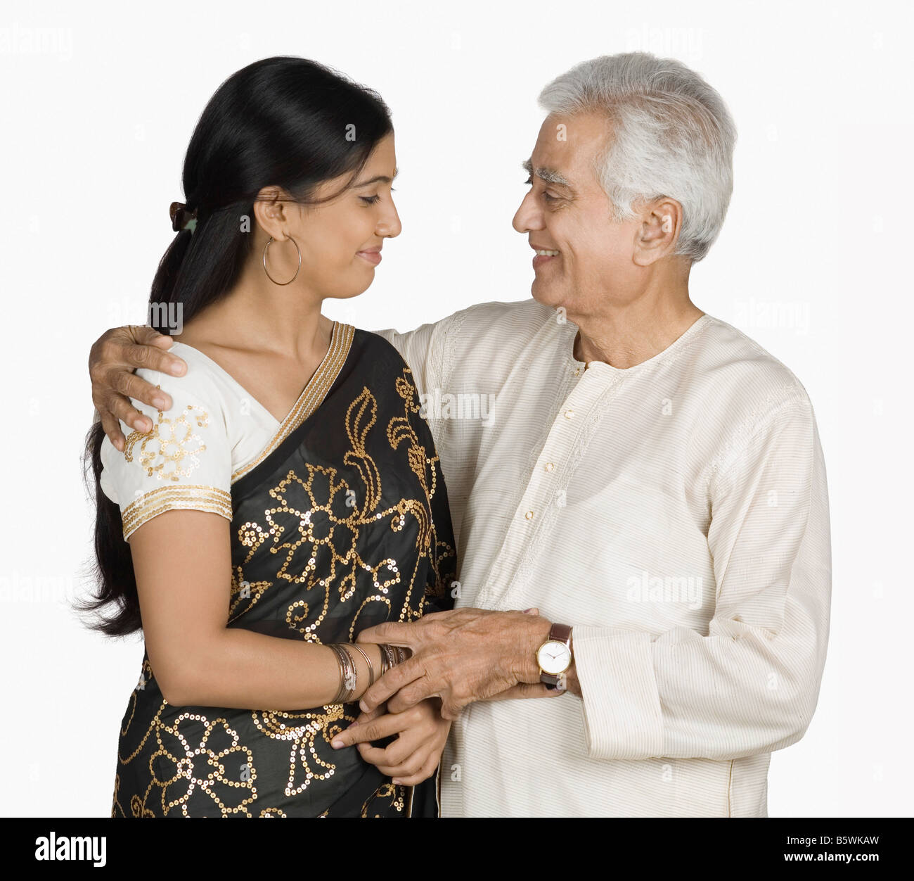 Close-up of a senior man hugging his daughter and smiling Stock Photo ...