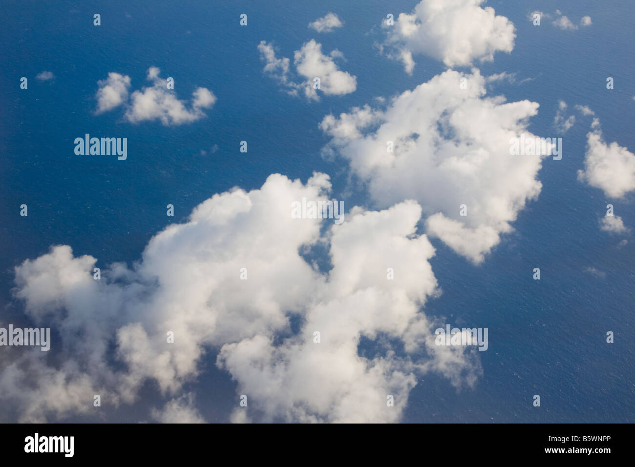 Clouds and sky out an airplane window over the caribbean Stock Photo ...