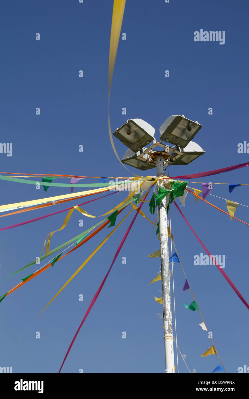 many colourful carnival flags decorations in street party outdoors in ...