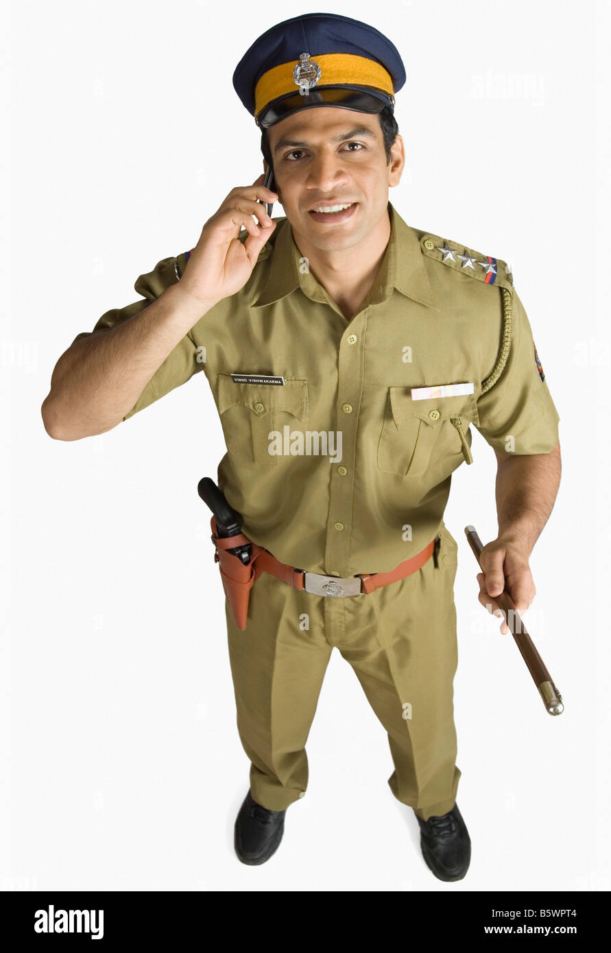 Policeman mobile phone hi-res stock photography and images - Alamy