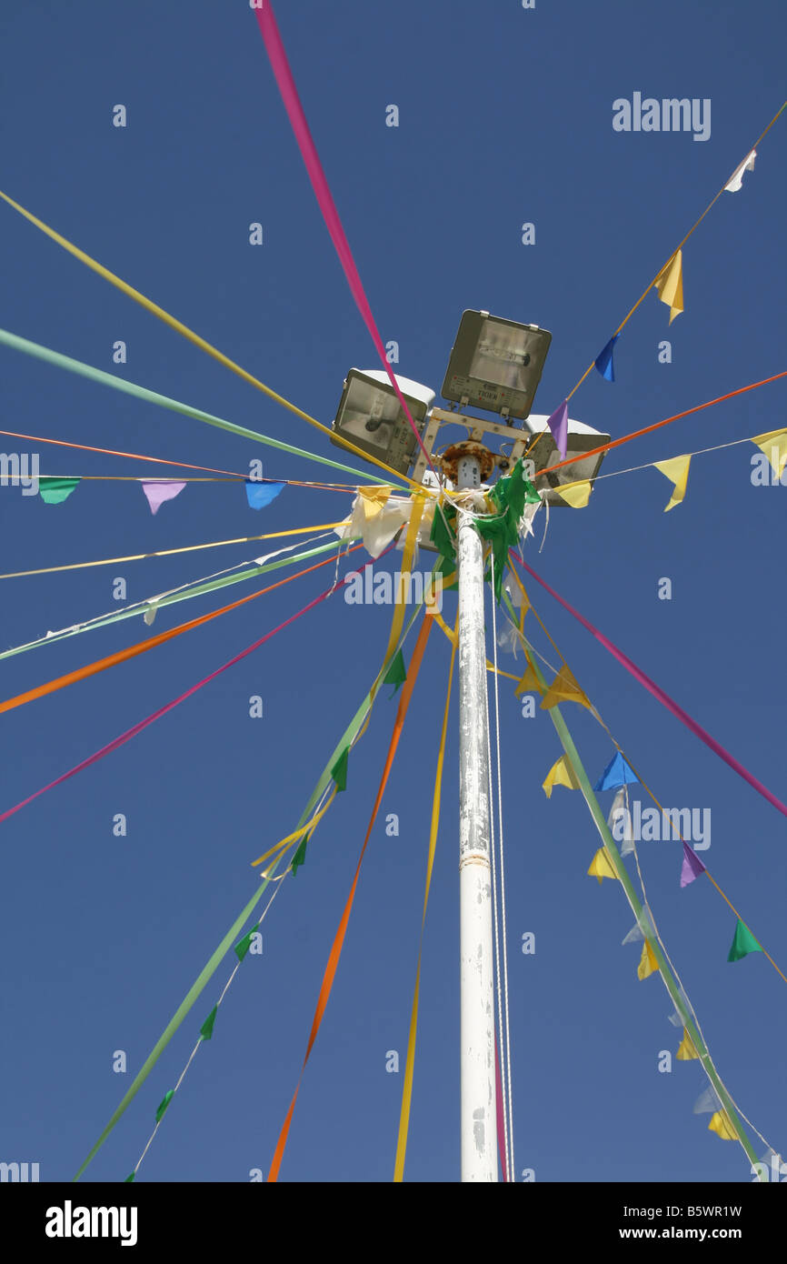 many colourful carnival flags decorations in street party outdoors in ...