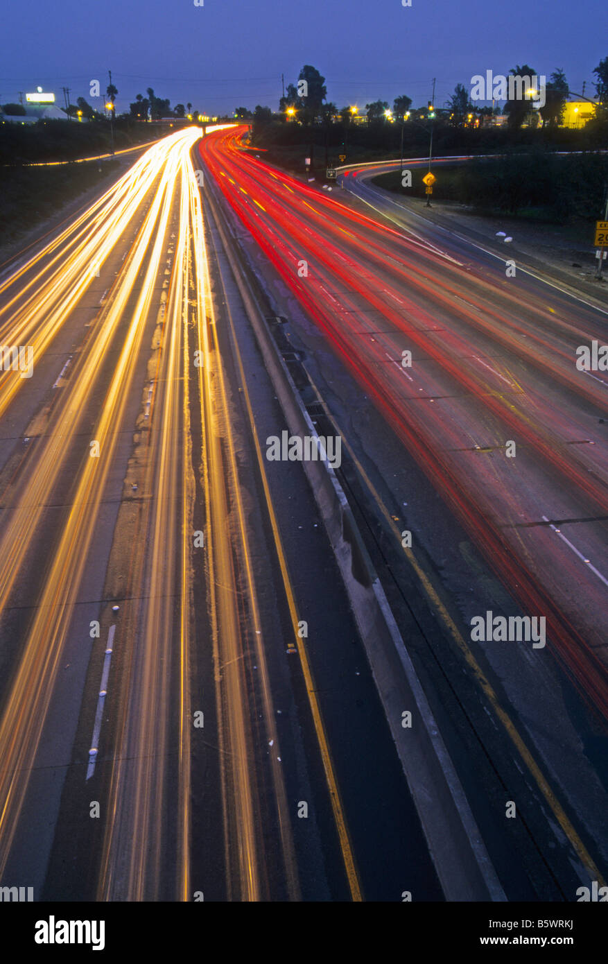 Night time exposure photo of California freeway with car light making ...