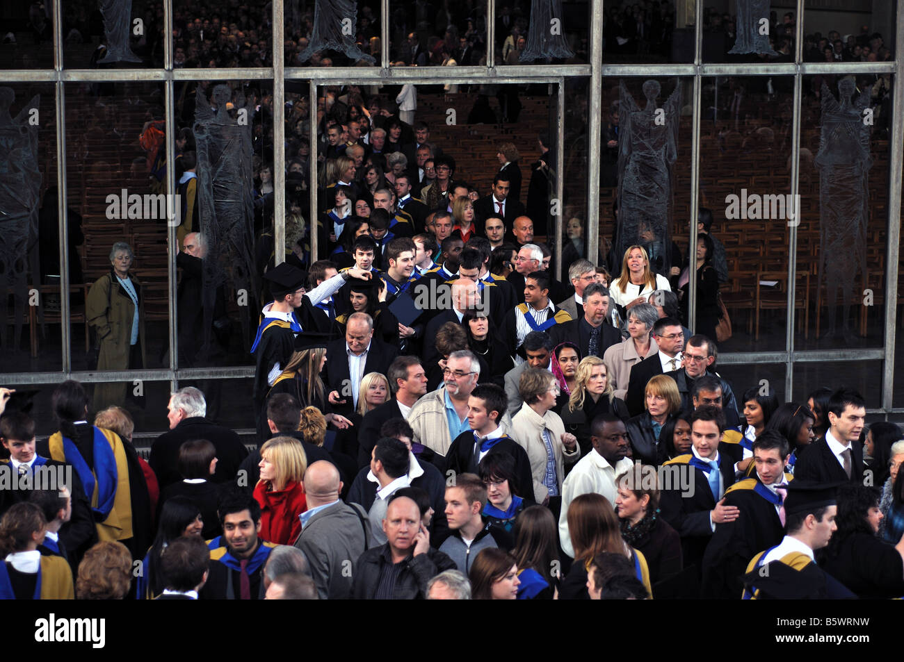 People leaving Coventry Cathedral after Coventry University graduation ...