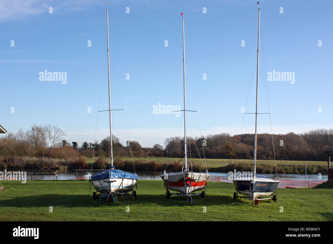Three sailing dinghys Stock Photo - Alamy