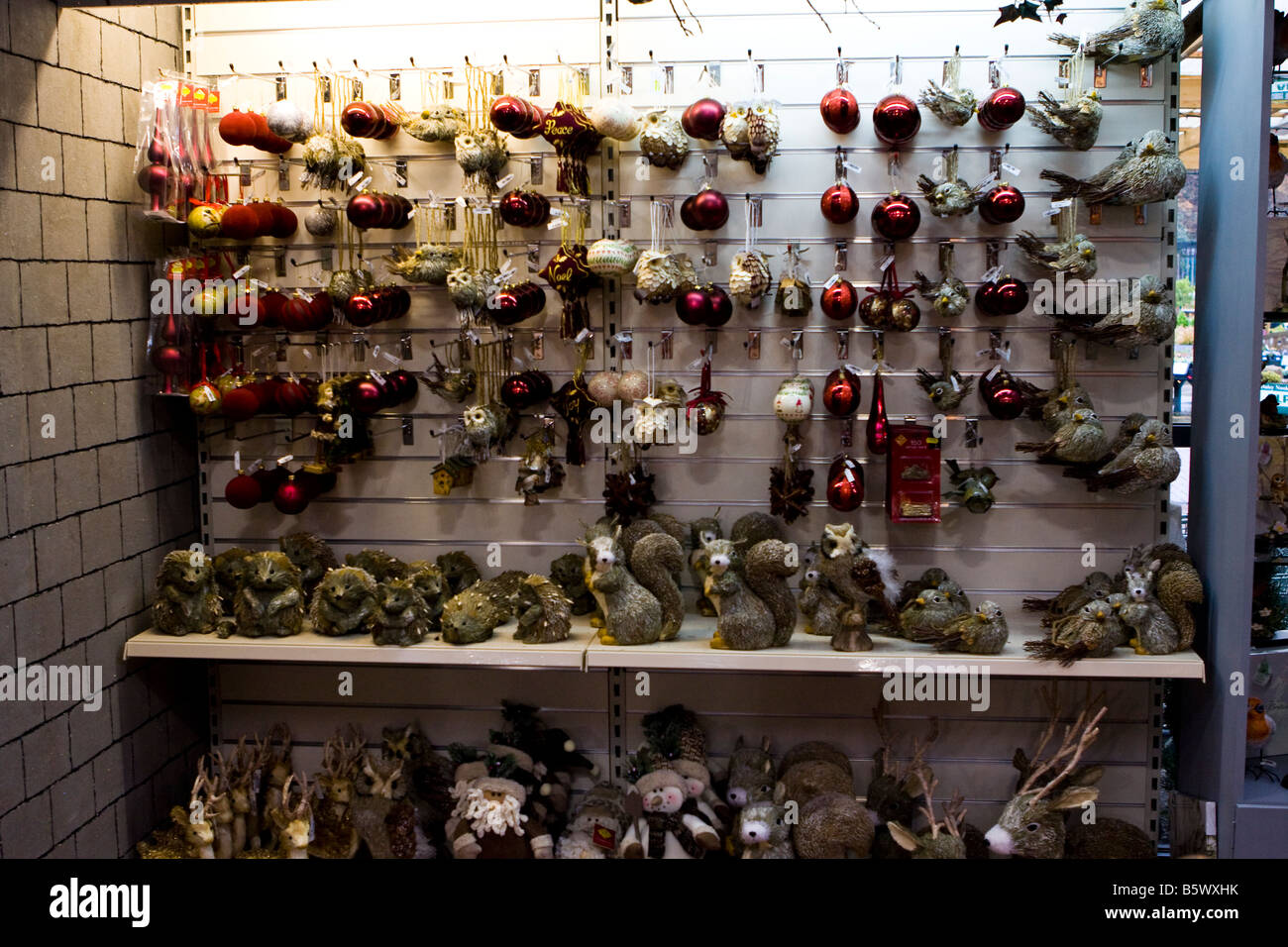 Merchandising display wall with green decorations made of straw & twigs ...