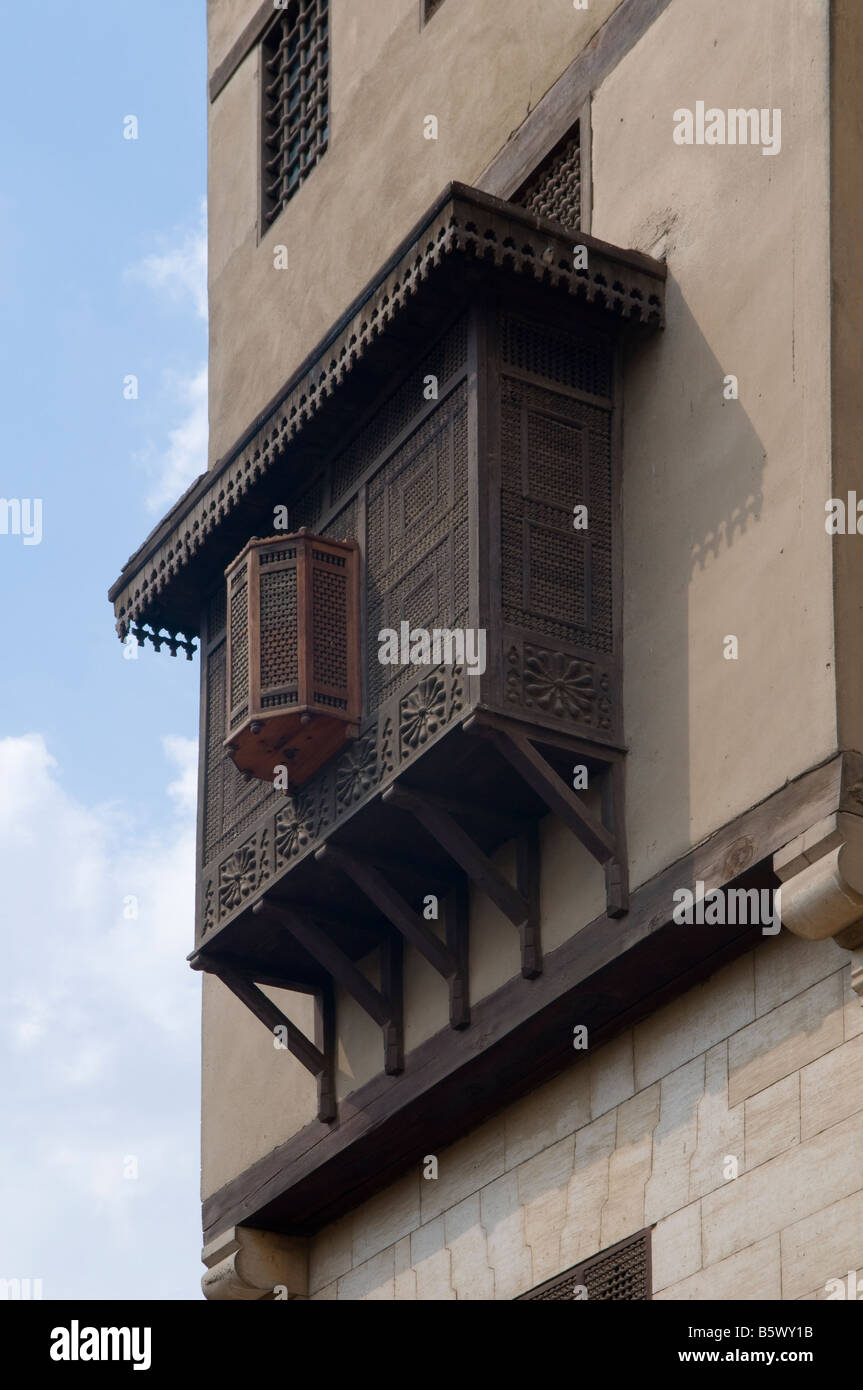 Egyptian style Mashrabiya oriel window enclosed with carved wood ...