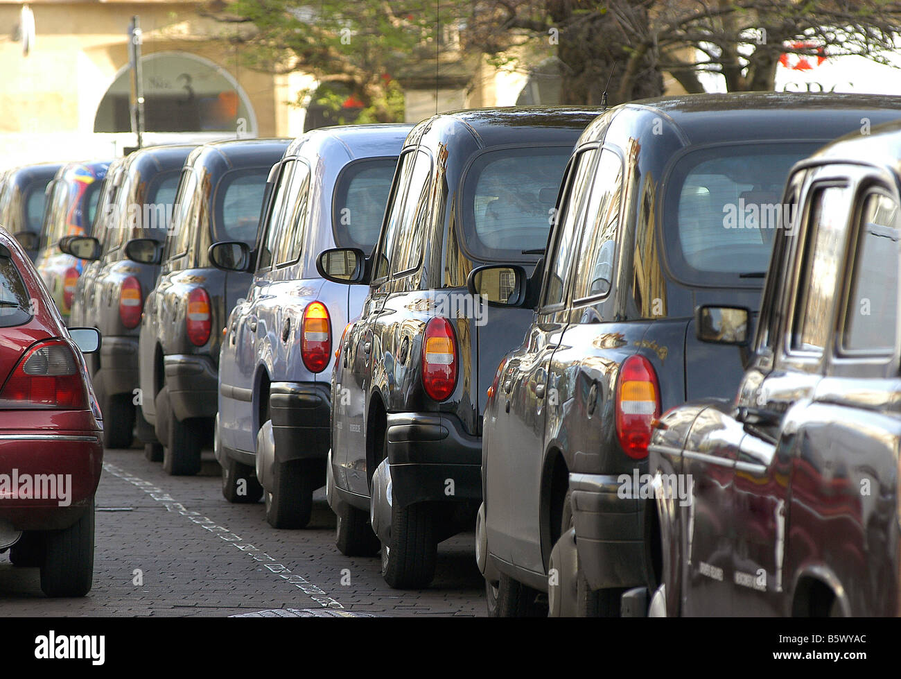 row of London taxi cabs Stock Photo - Alamy