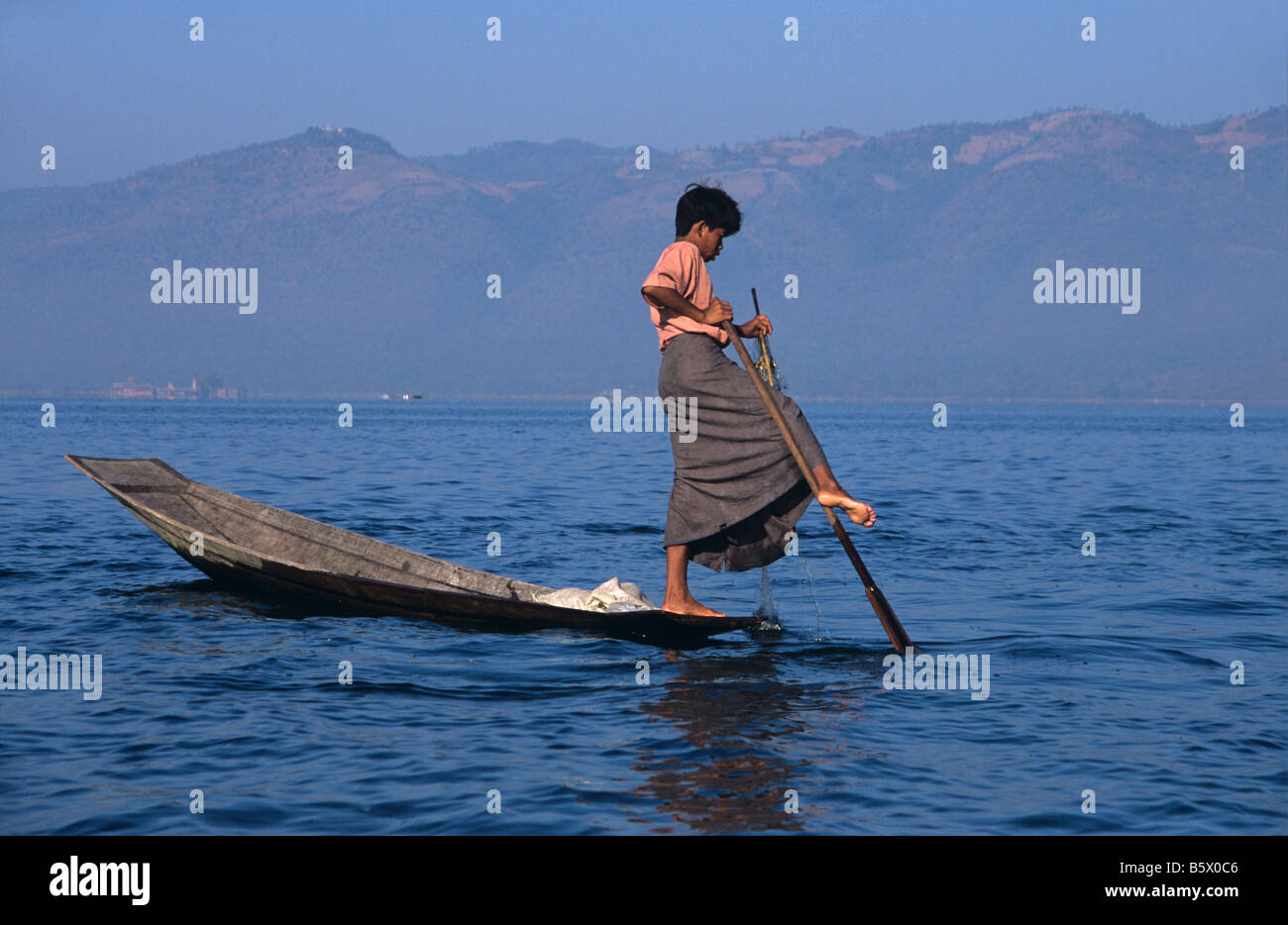 A Burmese Intha leg-rowing fisherman at Inle Lake, Burma or Myanmar ...