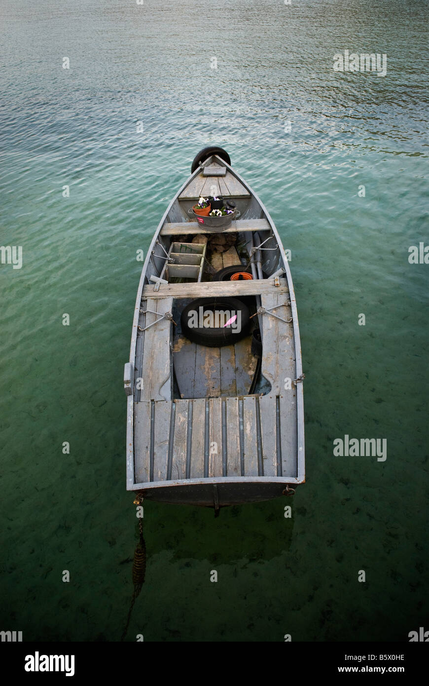 Small wooden boat in lac d'Annecy, Annecy, France Stock Photo - Alamy