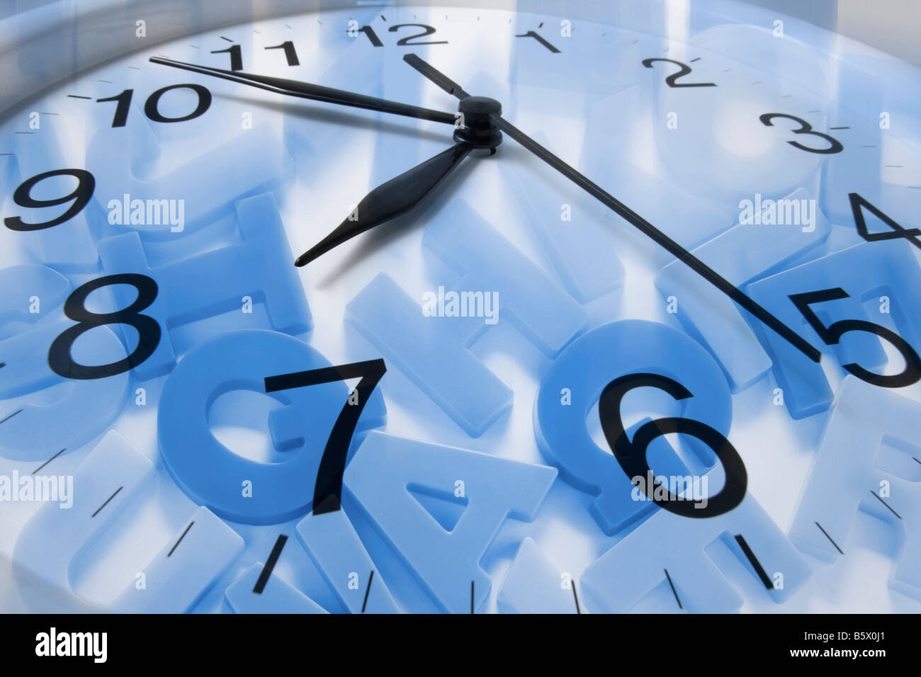Clock and Alphabets Stock Photo - Alamy