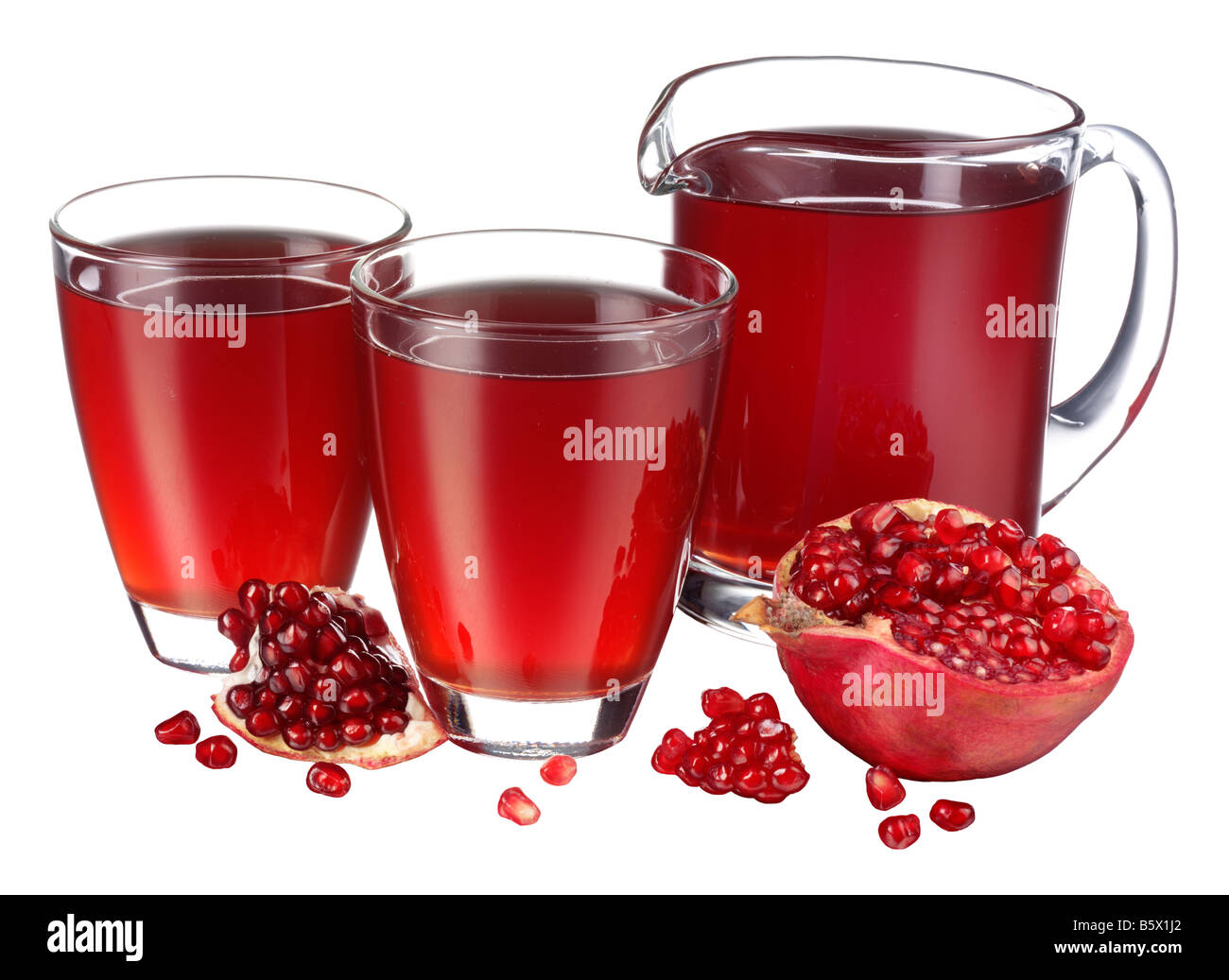 GLASS AND JUG OF POMEGRANATE JUICE CUT OUT Stock Photo - Alamy