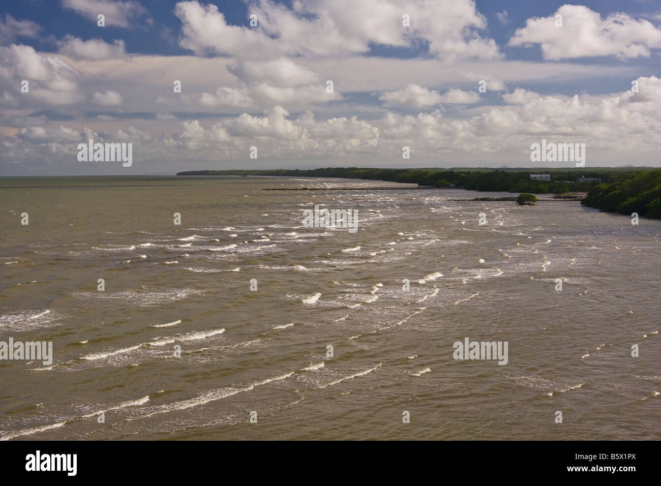 BELIZE CITY, BELIZE - Aerial view of coast and breaking waves Stock ...