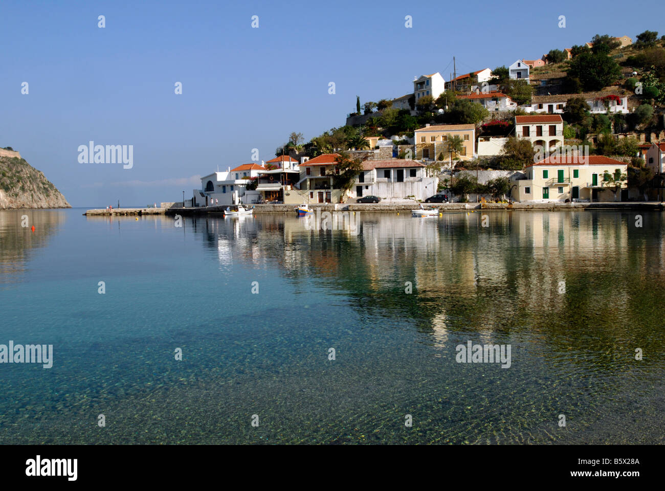 Assos, showing harbour and village, Kefallonia, in the Greek Ionian ...