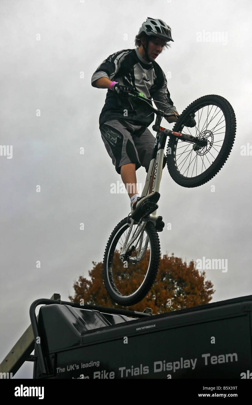 Trials bmx rider performs tricks at the 09 dirt bike show Stock Photo ...