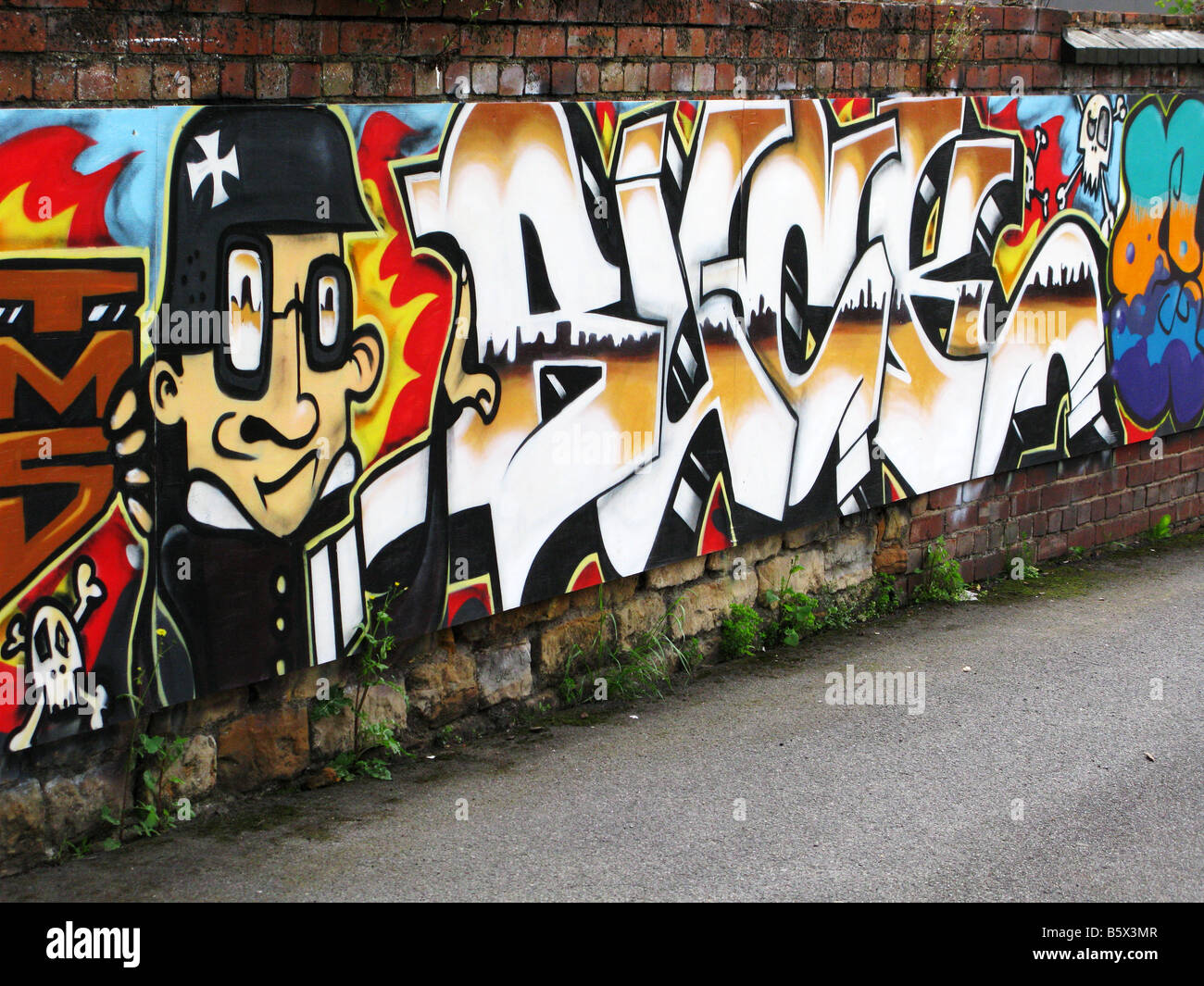 Graffiti painted on a wall,regarded as a form of art and other times ...