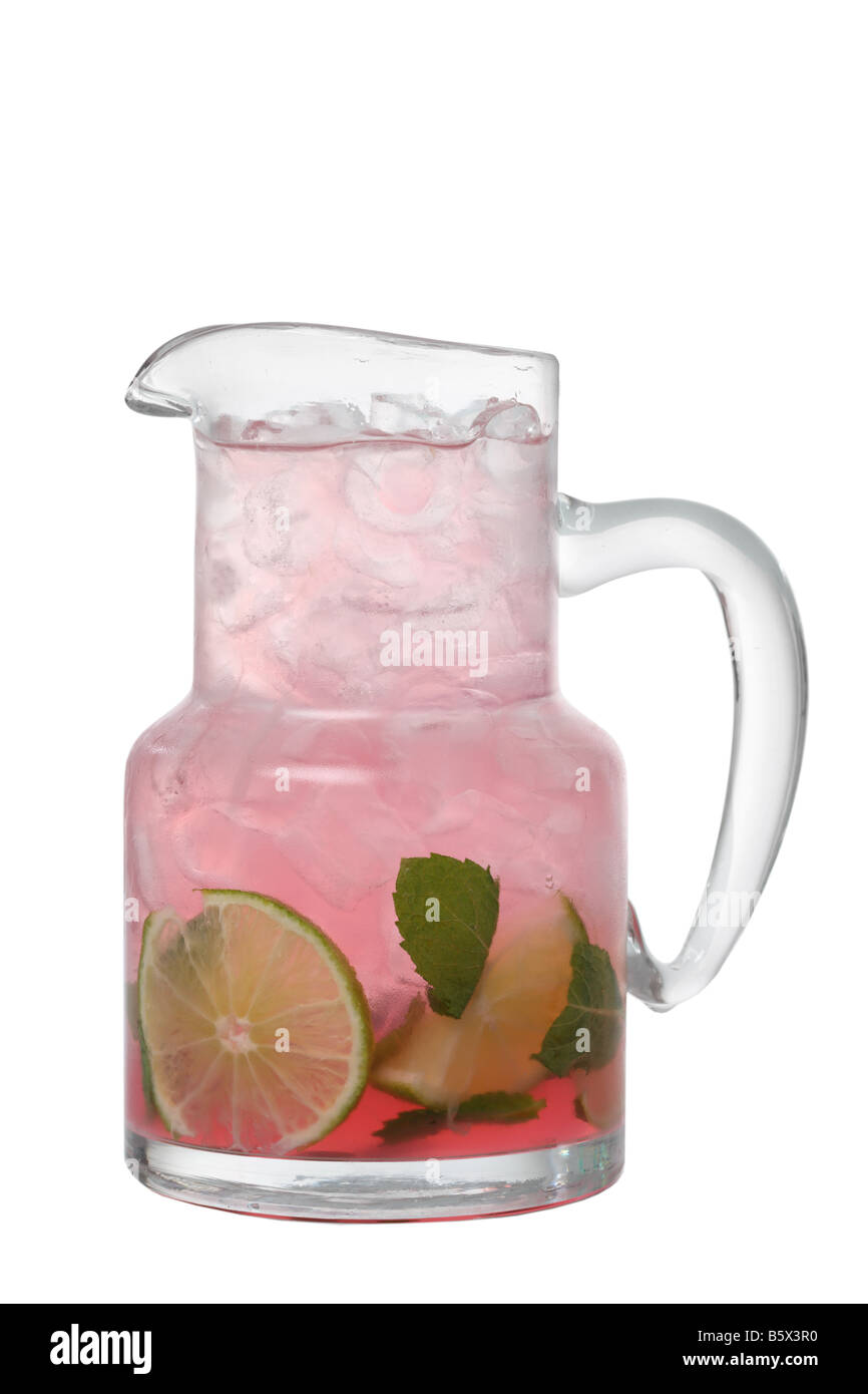 Pitcher pink beverage with limes and mint cutout isolated on white ...