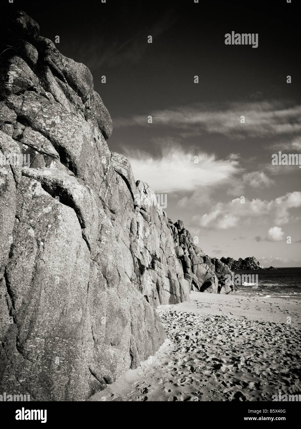 Granite cliffs at Porthcurno beach Stock Photo - Alamy