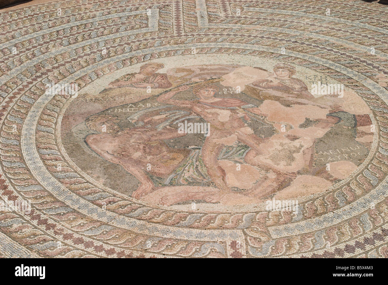 Circular mosaic depicting Theseus slaying the Minotaur in the House of ...