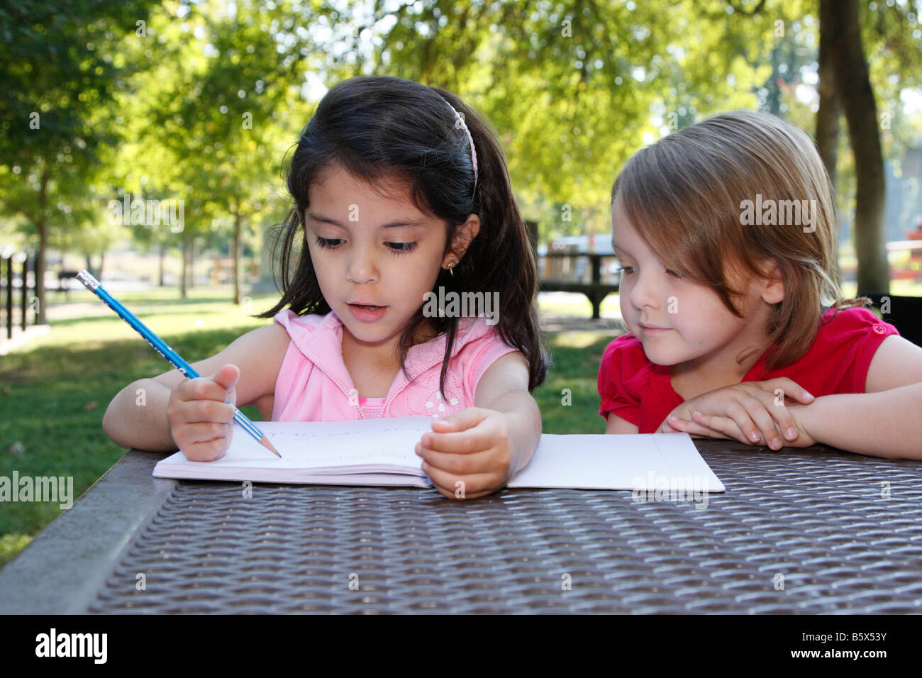 Two girls writing letters hi-res stock photography and images - Alamy