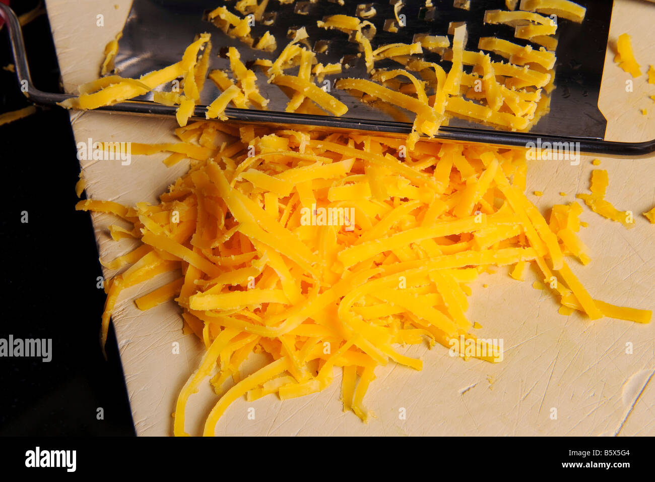 Dairy protein grated cheese hi-res stock photography and images - Alamy