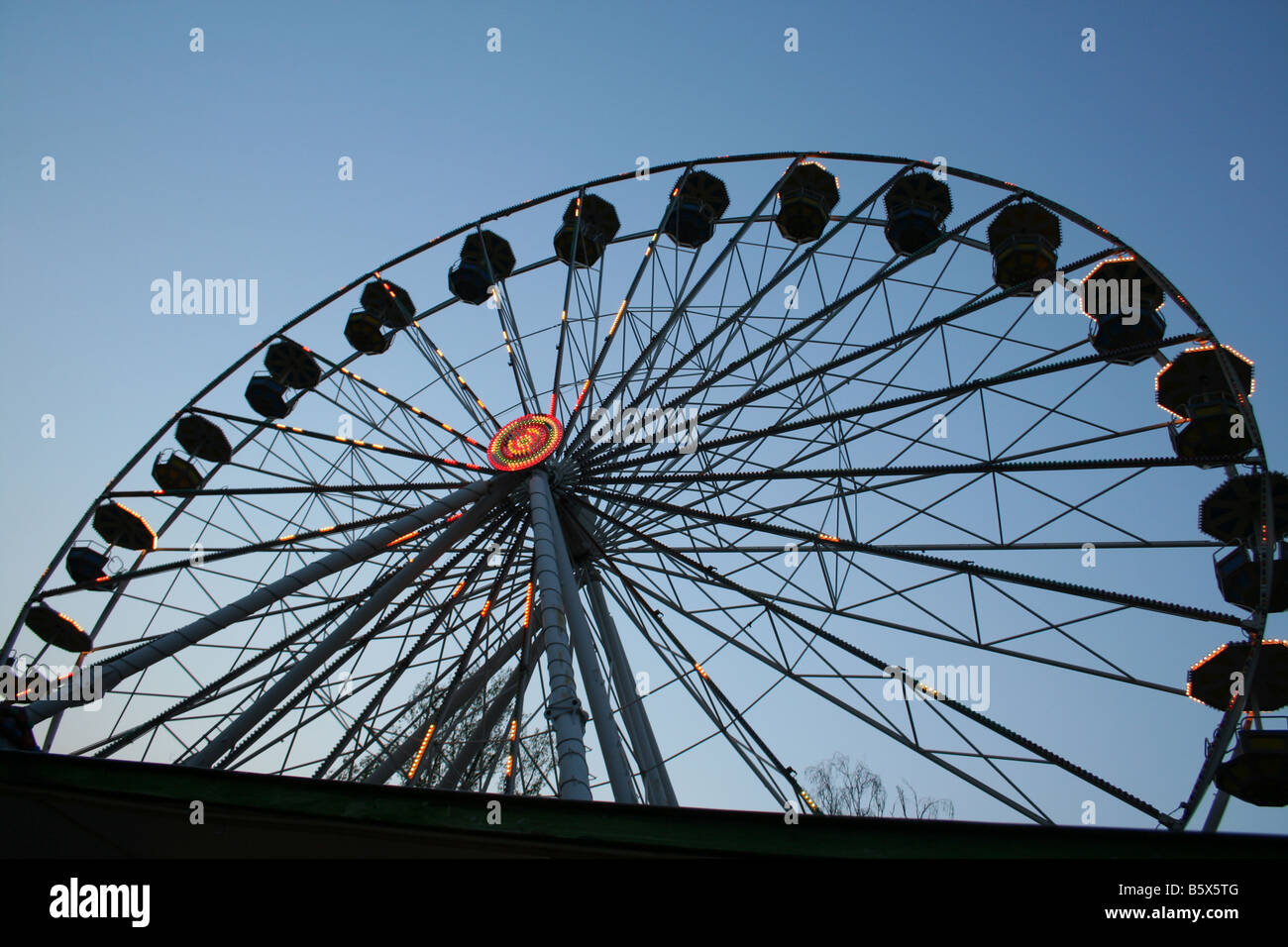 merry-go-round, roundabout, carousel in dusk Stock Photo - Alamy
