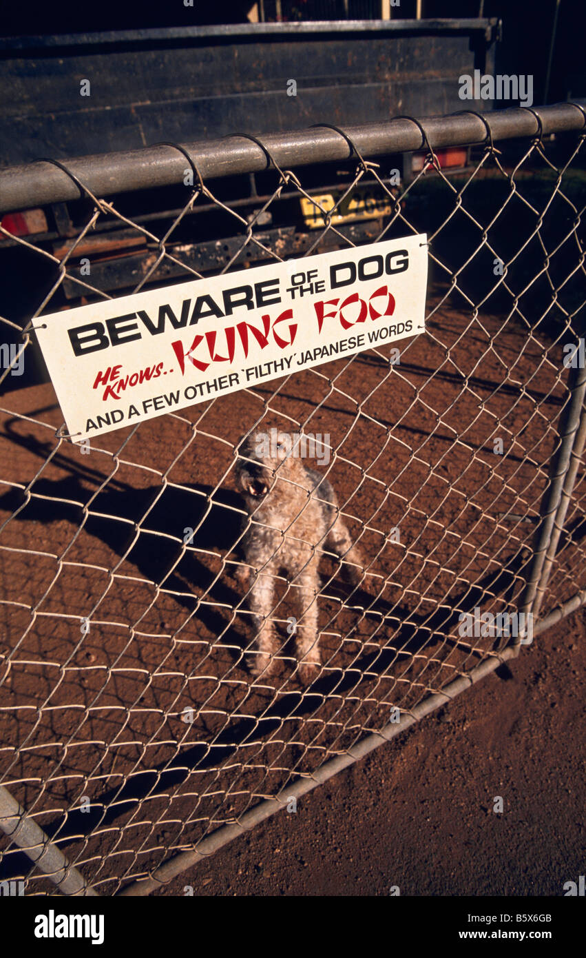 Funny dog warning sign hi-res stock photography and images - Alamy