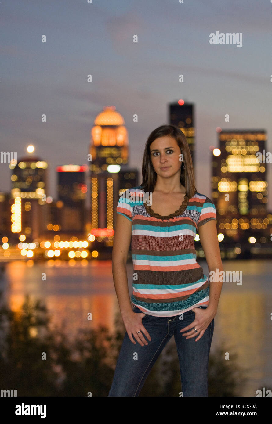 Teenage Girl Posing in Front of the Louisville Kentucky Skyline at Dusk ...