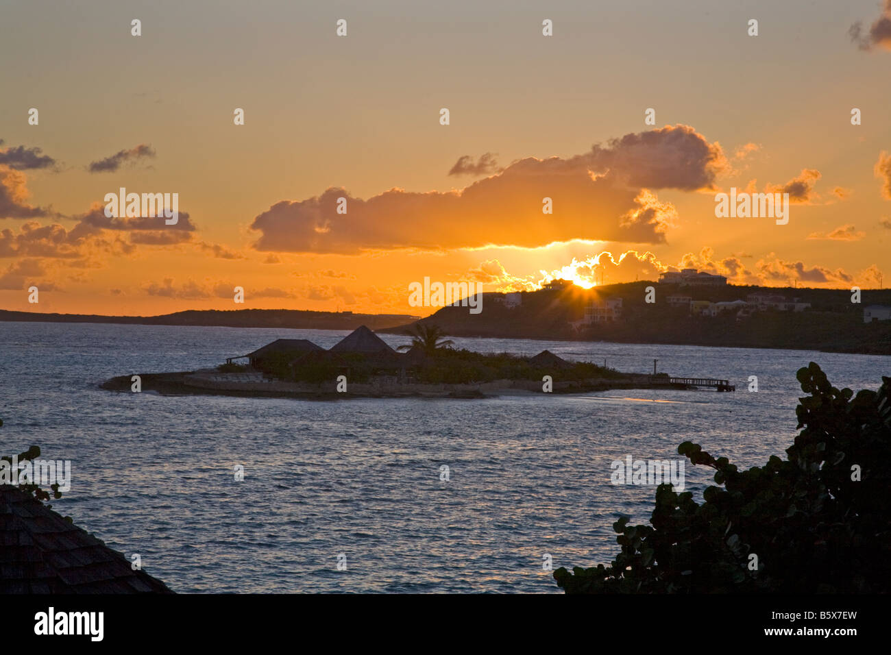 Sunrise over Island Harbour and Scilly Cay on the caribbean island of ...