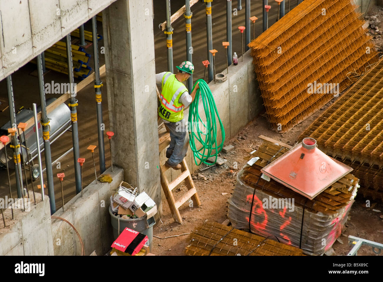 Worker at a construction site Stock Photo - Alamy