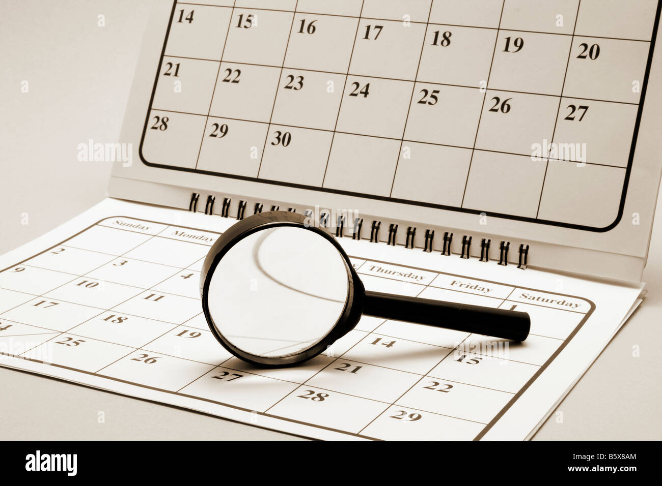 Magnifying calendar hi-res stock photography and images - Alamy