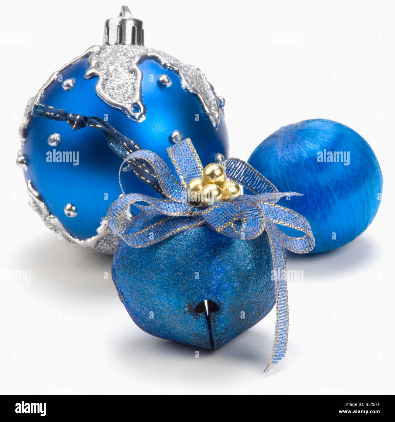 Three blue Christmas ornaments Stock Photo - Alamy