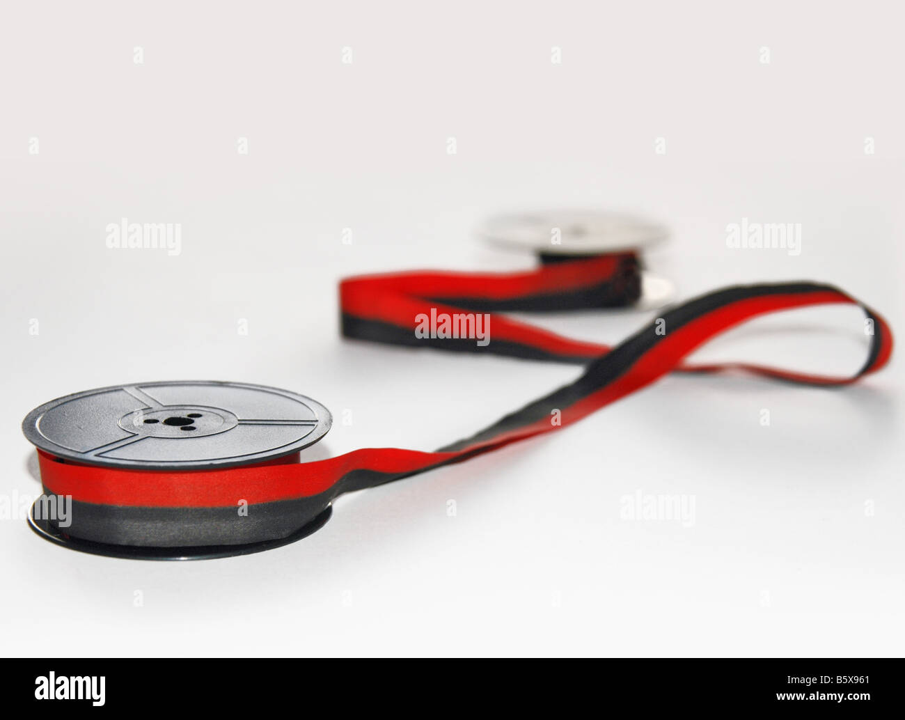 Typewriter ribbon - red and black Stock Photo - Alamy