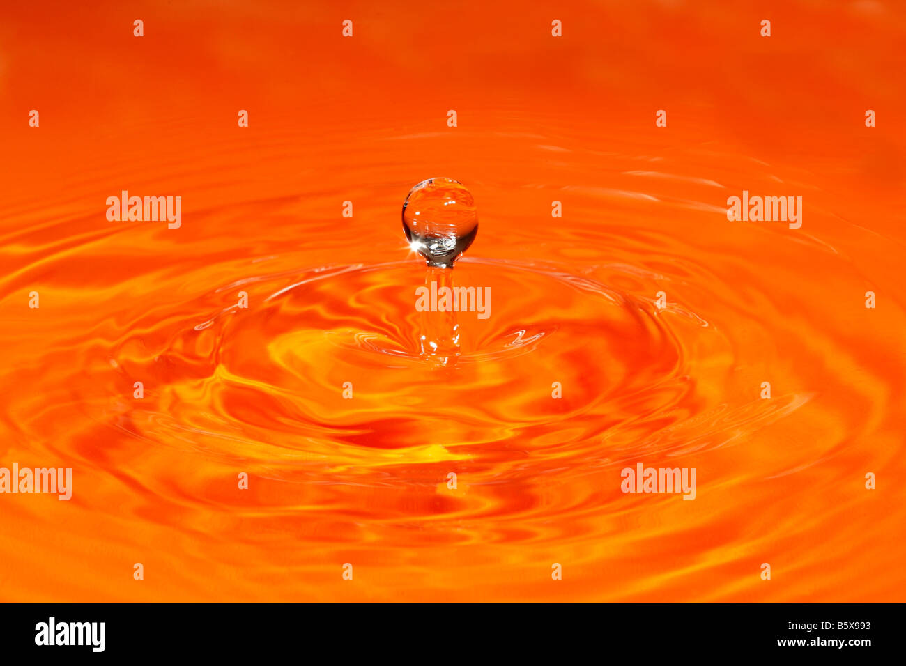 Water droplets splashing down Stock Photo - Alamy