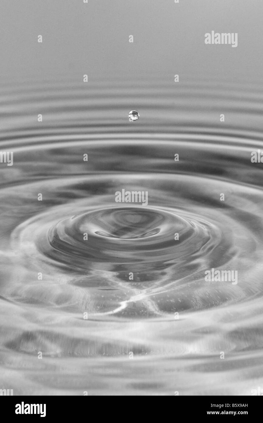 Water droplets splashing down Stock Photo - Alamy